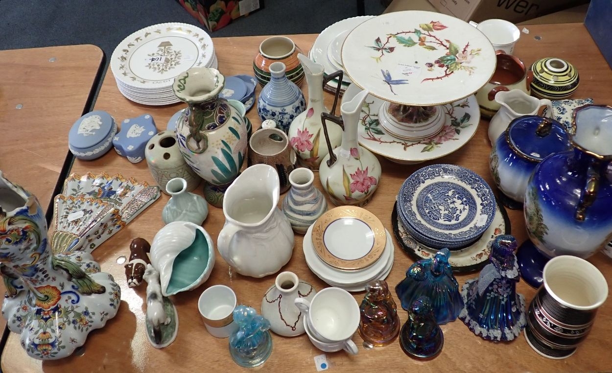 A QUIMPER POTTERY VASE 30cm high (damaged), a ditto wall pocket and a ...