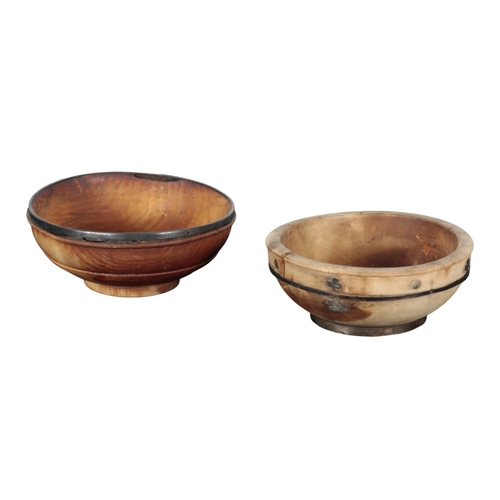 THREE TURNED AND METAL MOUNTED BOWLS one example with silver banding by ...
