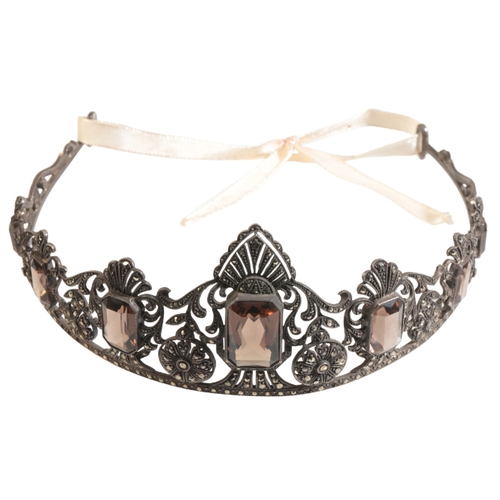 A SMOKEY QUARTZ AND MARCASITE TIARA set in grey coloured metal, with 7 ...