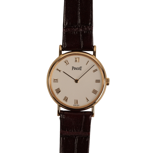 PIAGET: A LADY'S 18CT GOLD WRISTWATCH with quartz movement, the white ...