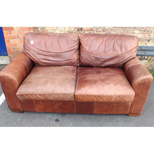 A MODERN LEATHER TWO-SEAT SOFA with patinated surface, 175cm wide, 90cm ...