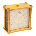 JAEGER: A BRASS EIGHT DAY TRAVEL CLOCK with keyless wind movement, the ...