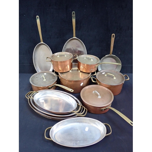 A SET OF STEEL-LINED COPPER PANS, BY WAGNER West Germany, and a small ...