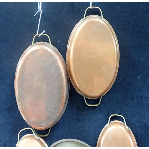 A SET OF STEEL-LINED COPPER PANS, BY WAGNER West Germany, and a small ...