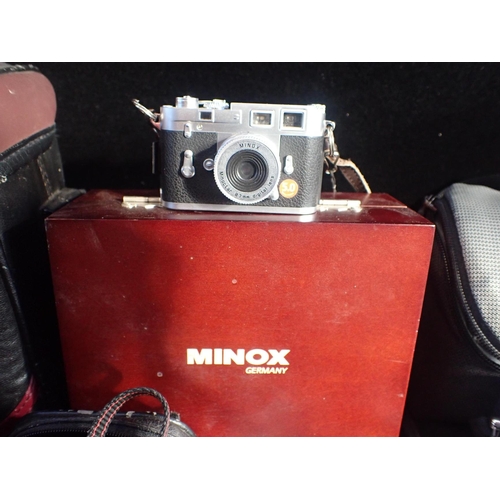 A MINOX 'DCC LEICA M3' DIGITAL CAMERA with case, box and instructions ...