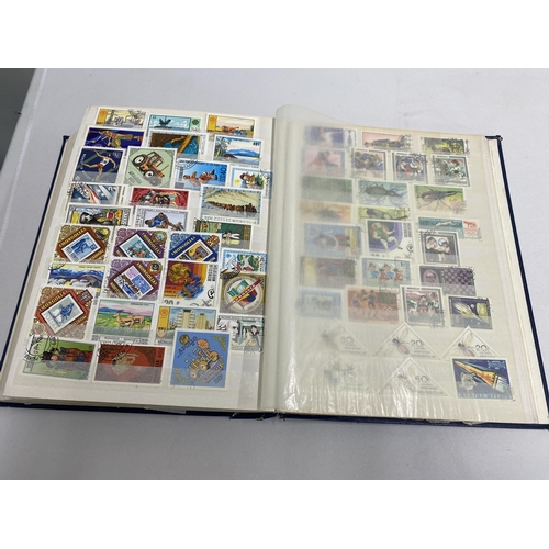 An album containing over 2000 stamps including a large quantity of ...