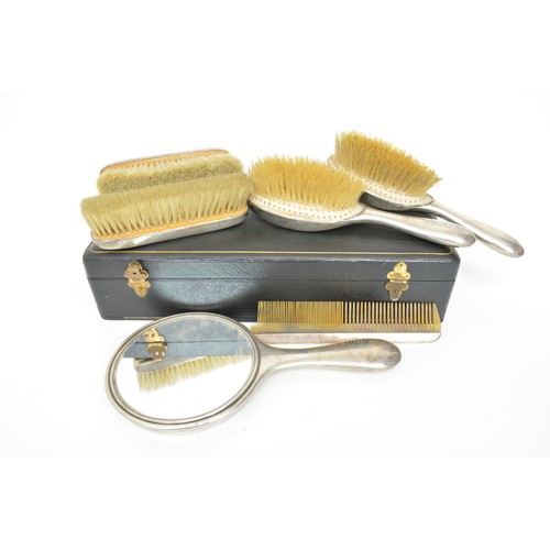Cased silver vanity set together with art nouveau brush of repousse ...