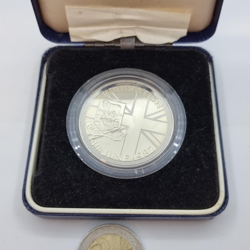 A sterling silver 50p coin, celebrating the liberation of the Falkland ...