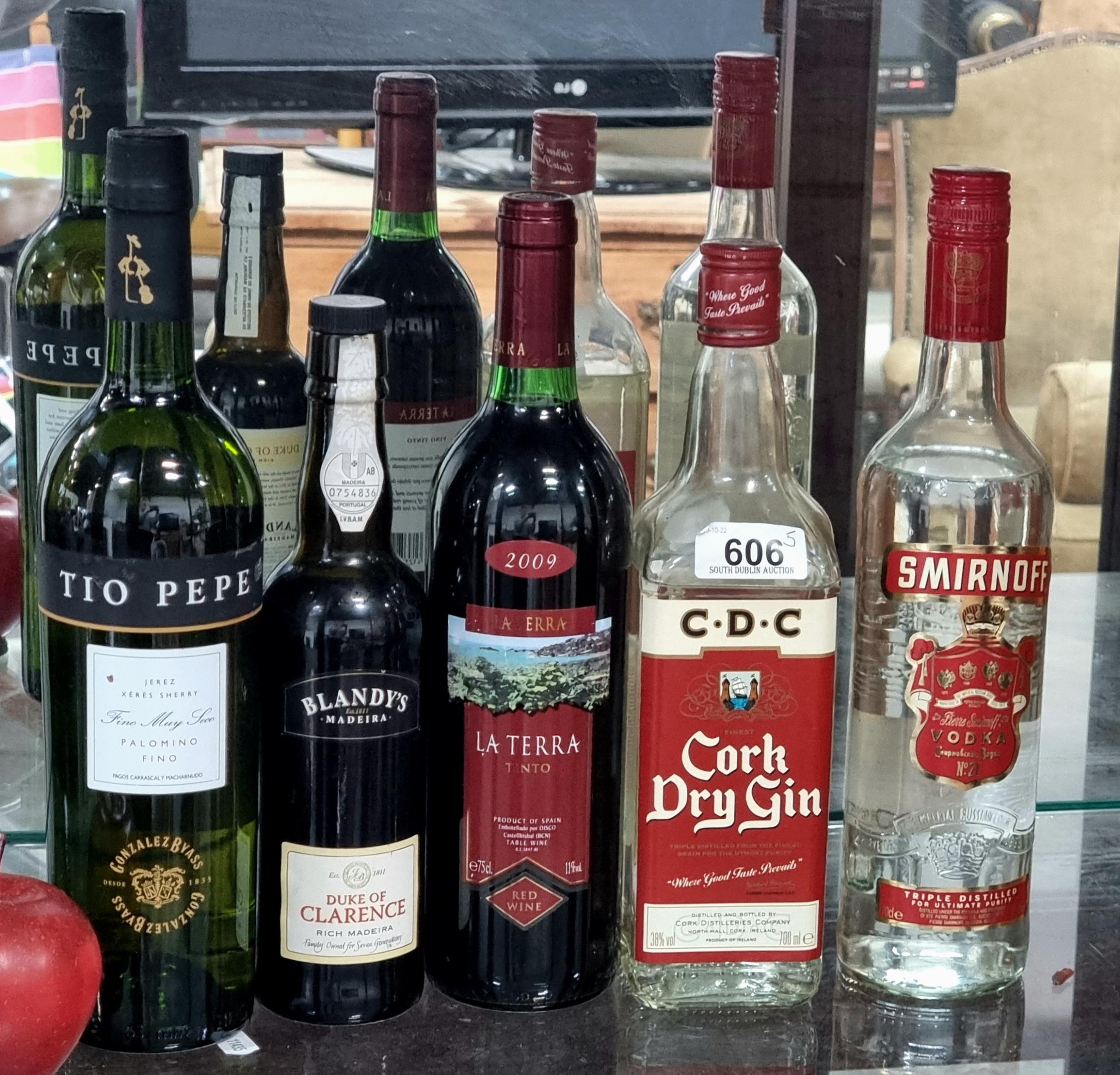 A selection of five sealed bottles of alcohol. Including a 700ml bottle ...