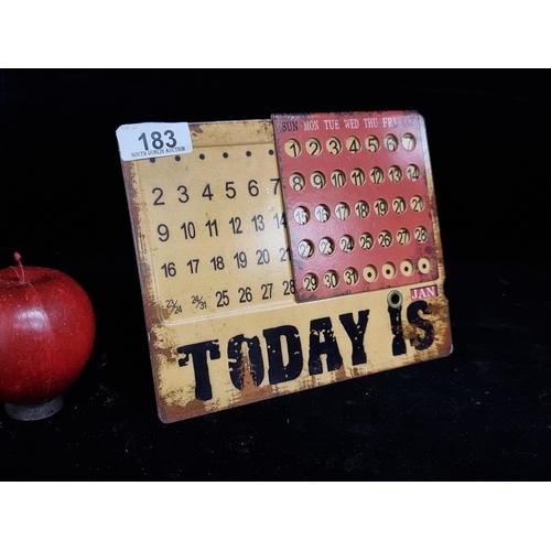 A cast metal perpetual calendar. With folding stand for display on desk ...