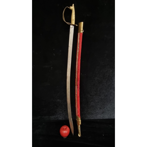 A vintage Indian Sabre Sword with decorative details. Featuring a brass ...