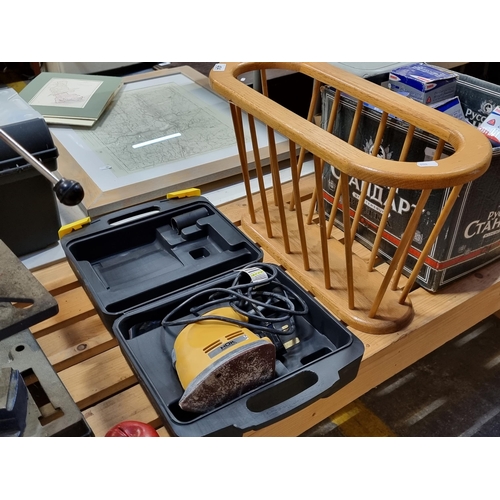 Two items comprising of a ROK Powertools 105W Palm Sander in original hard carry case. Along with