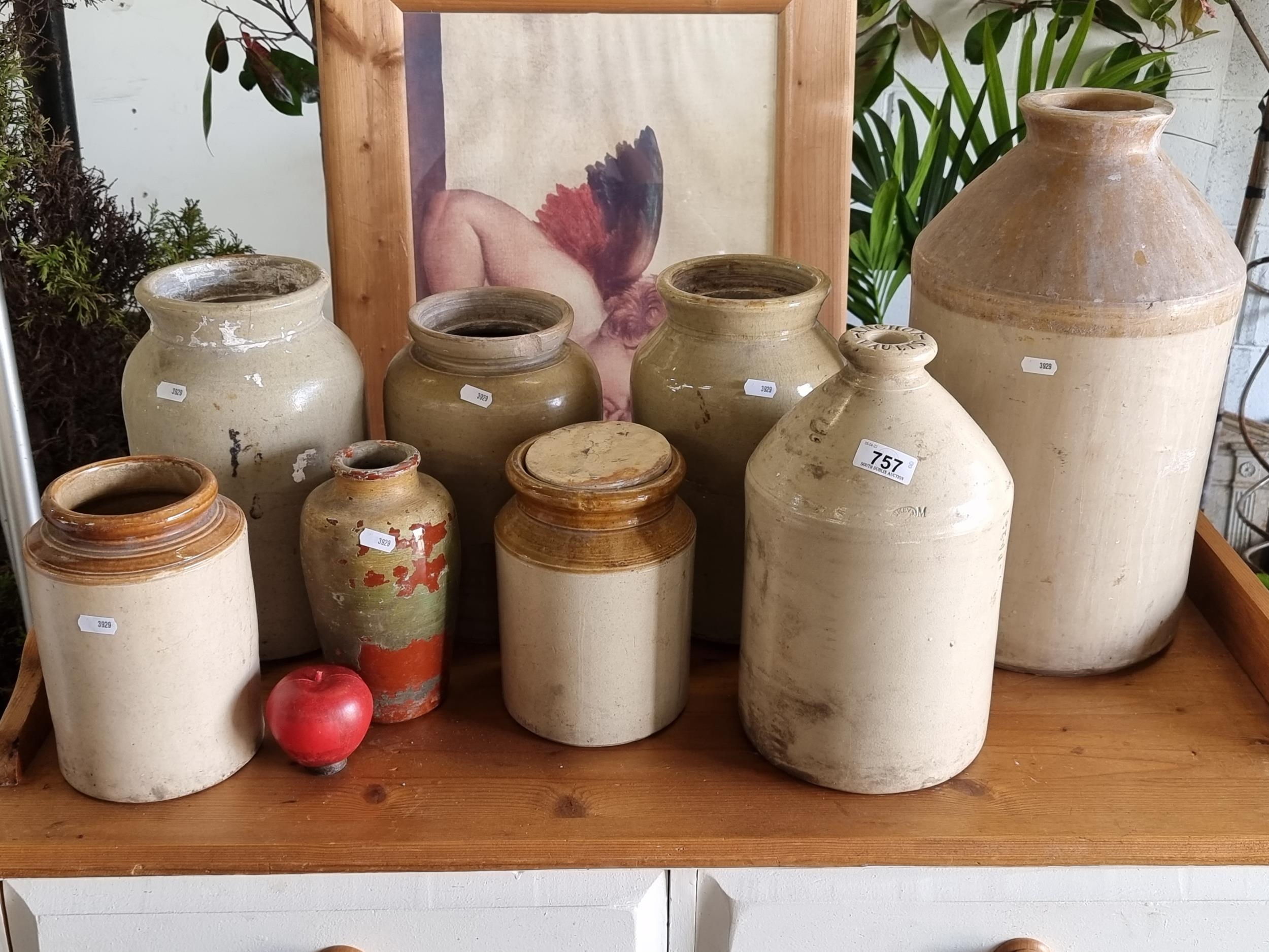 Eight examples of vintage and antique stoneware jars. Including a 19th ...