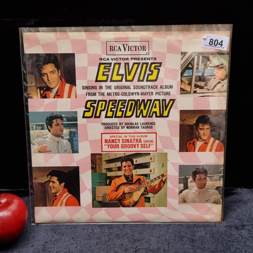 A rare vinyl record album of Elvis Presley titled "RCA Victor presents ...