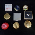 A selection of five vintage powder compacts by Stratton England ...