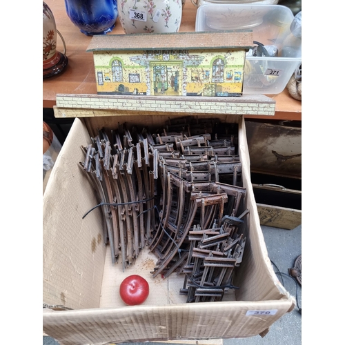 A fantastic vintage model train set with dozens of pieces of cast metal ...