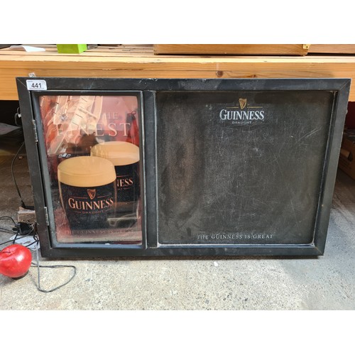 A vintage Guinness advertising light-up chalkboard. With the slogan ...