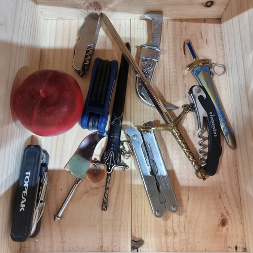 A mixed lot including wine corkscrew, prop daggers, multitools and army ...