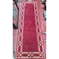 Star Lot : A large thick irish rug / runner with a geometric design in ...