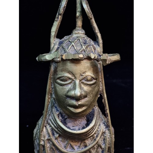 A solid brass bust of the Oba of Benin, the ruler of the Edo people ...