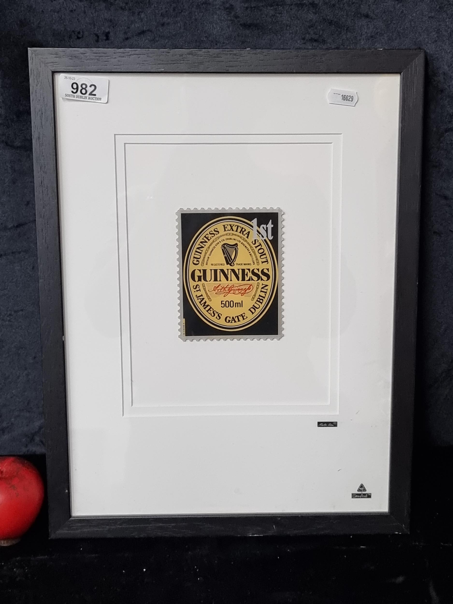 An oversized 'Can Art' stamp featuring the Guinness logo to centre ...