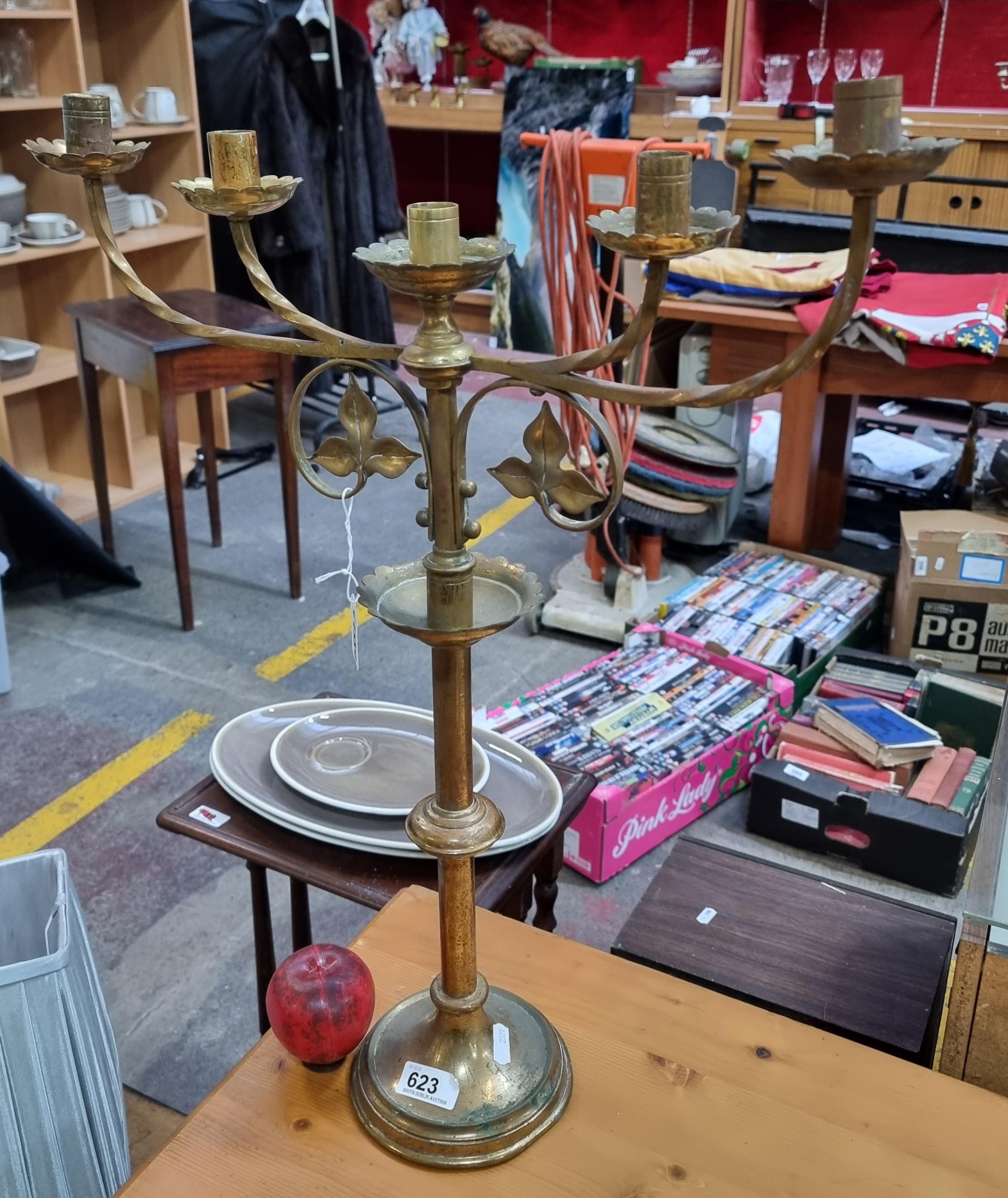 An impressive antique church five branch candle holder boasting wax ...