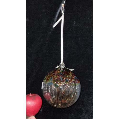 A large gorgeous hand blown glass ball by D & J Glassware. Titled 'The ...