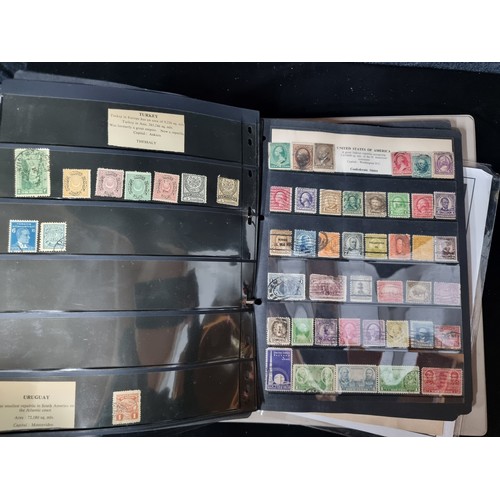 A exquisite stamp album in Leather hardback. Containing a collection of ...