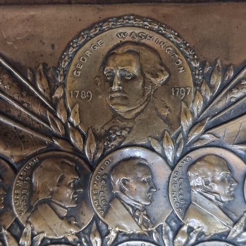 An interesting hammered brass plaque featuring George Washington and ...