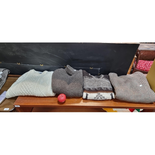 Four vintage hand made Irish style woolen jumpers including a Land's ...