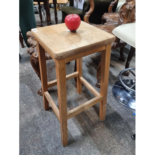 A wooden lab stool supported by 4 legs and tier beneath. Ideal and ...