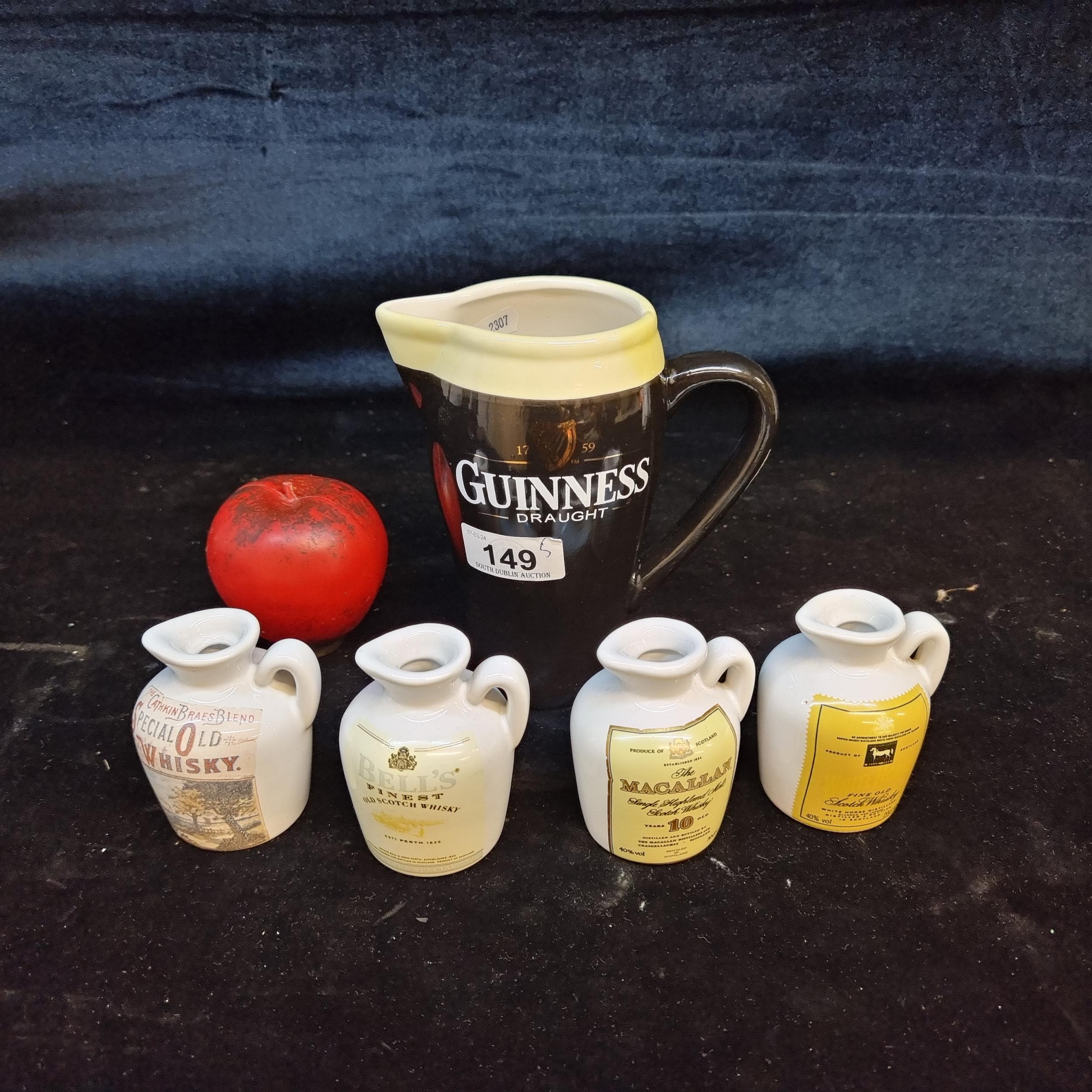 Five items of breweriana including a Guinness jug and four miniature ...