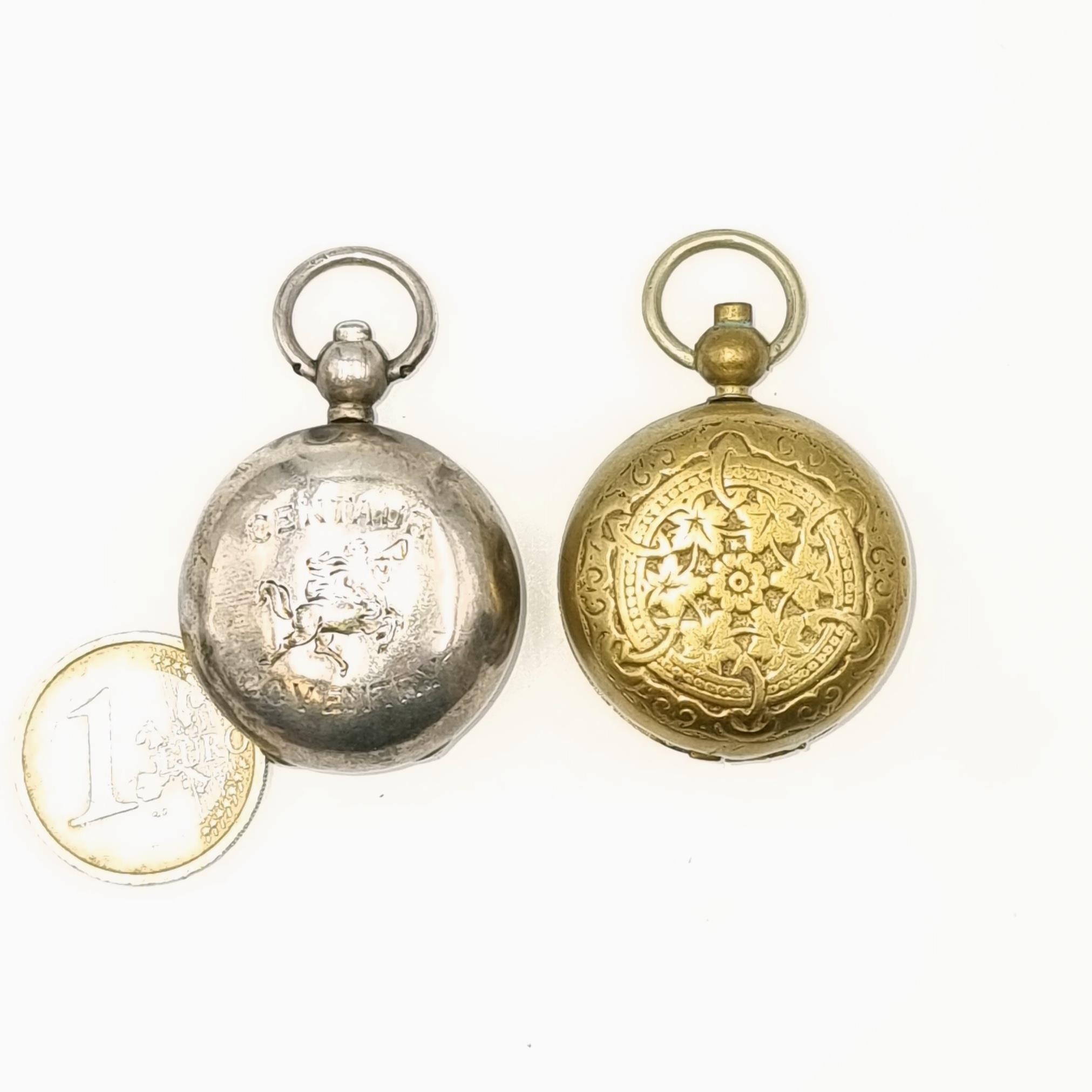 Two antique sovereign holders. A sterling silver example together with ...