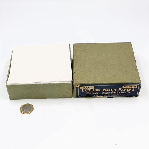 A filled box of 1000 watch papers.