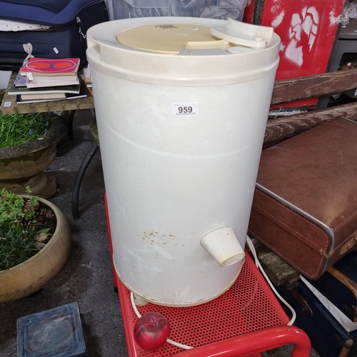 A portable White Knight 1400 spinner / dryer.