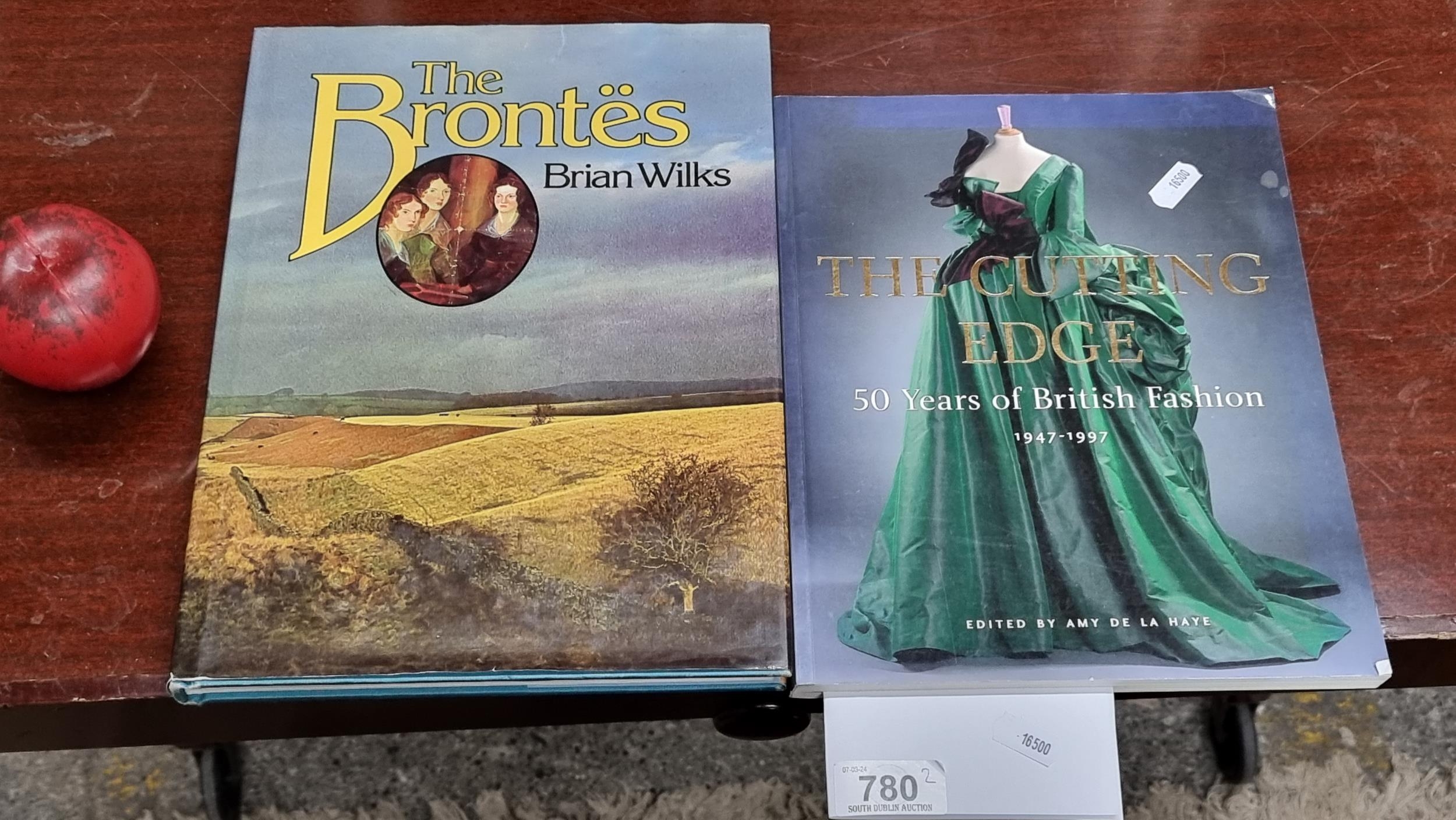 Two large books including a large hardback example titled 'The Brontës ...