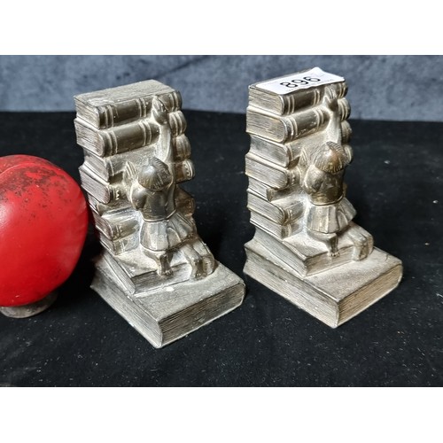 Two lovely vintage silverplated bookends in the form of a girl climbing ...