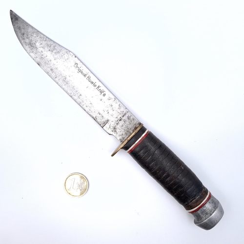 An original Bowie knife with leather handle and alloy pommel. Length of ...