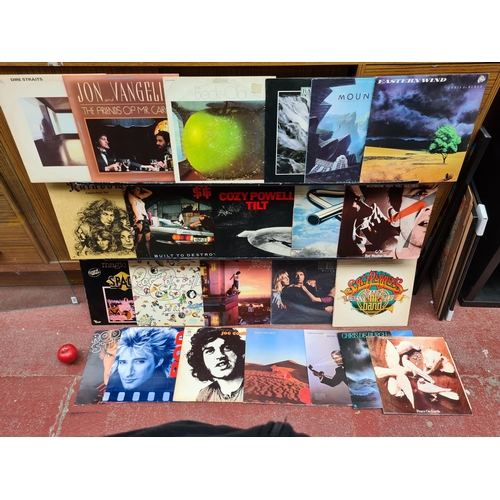 A selection of 22 LP / vinyl records from artists such as Led Zeppelin ...