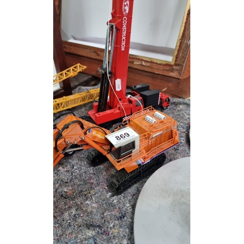 Three metal Model Construction Vehicles Description: Hitachi EX1800 ...