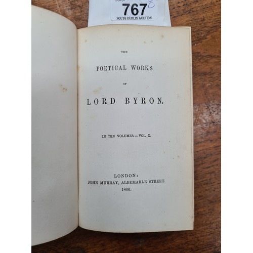 A collection of eight leather-bound antique books titled 'The Poetical ...