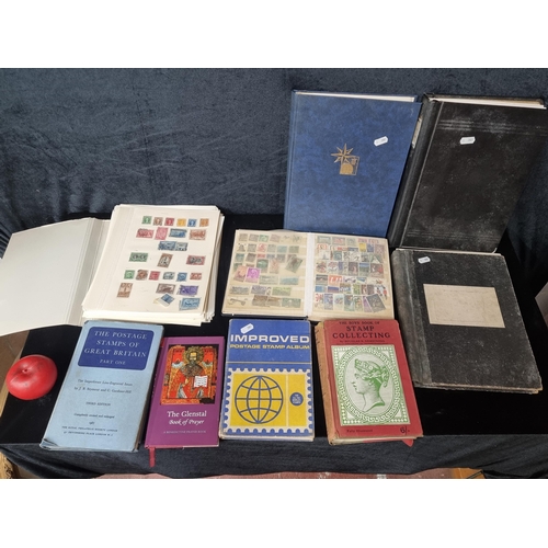 A box containing six vintage stamp albums. Unchecked. Lot also includes ...