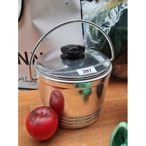 A stylish mid century Eagle branded chrome ice bucket, with lined interior.