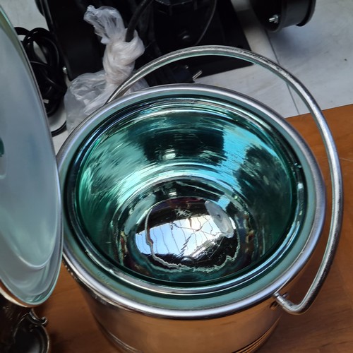 A stylish mid century Eagle branded chrome ice bucket, with lined interior.