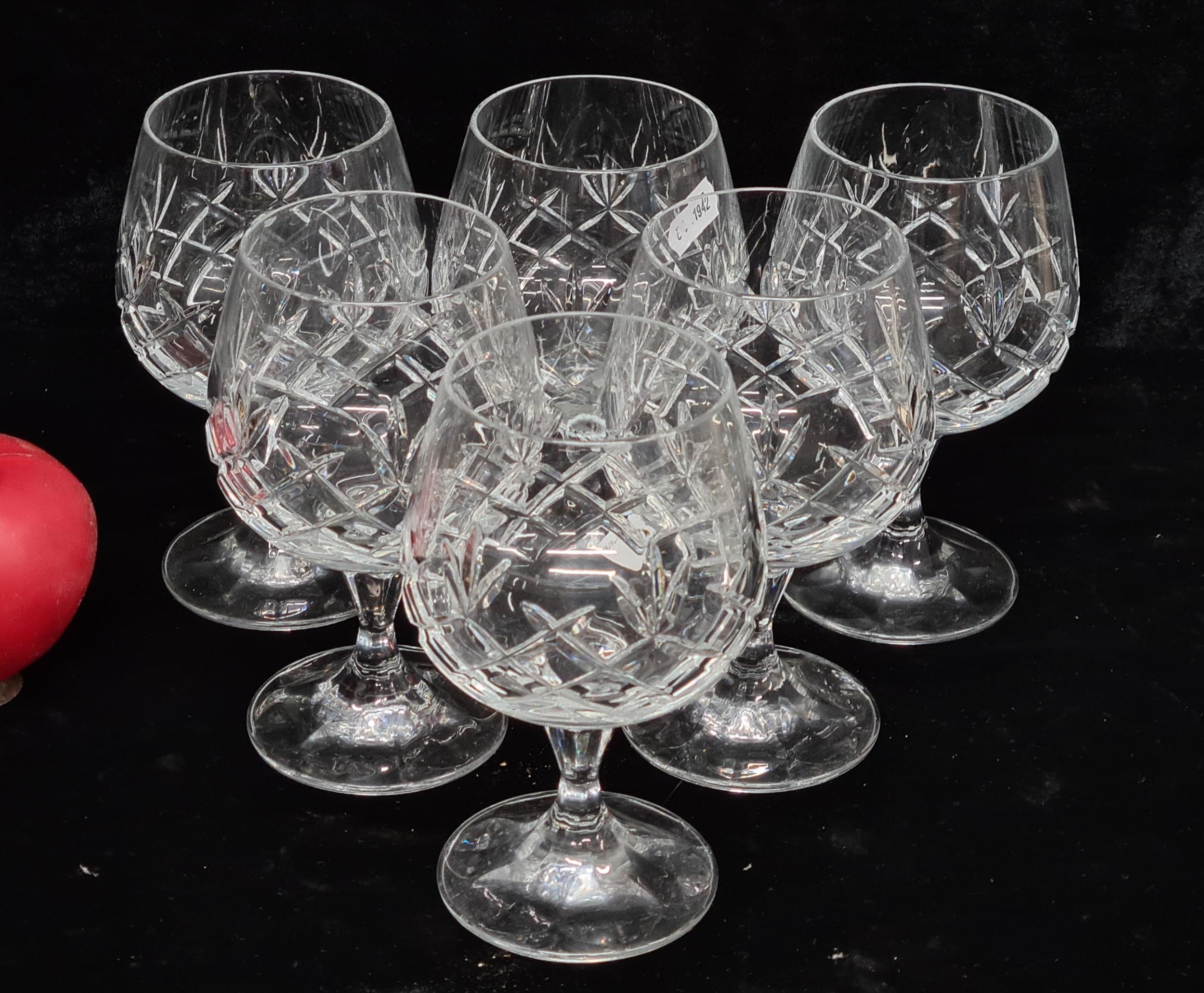 A stunning set of six cut glass brandy Balloon glasses.