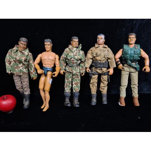A selection of five 90's Action Man figures all dressed in military attire.