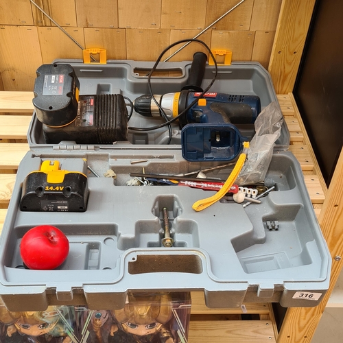 A Ryobi 14.4V CDI 1441 cordless battery operated drill with two batteries and charger. Comes with ca
