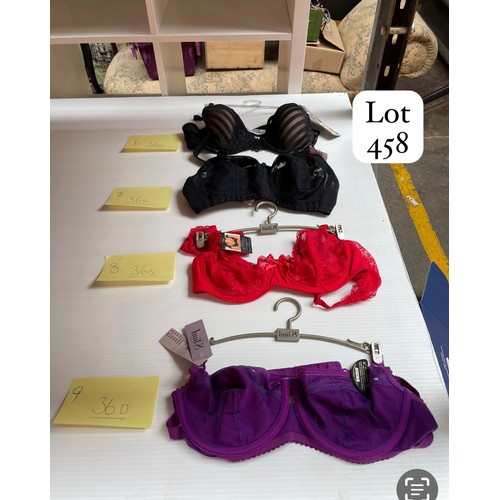 A box containing nine brand new ladies bras, all with tags including ...
