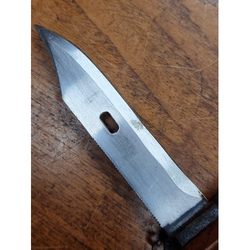 A military AK47 AKM Type II Bayonet knife with Bakelite scabbard.