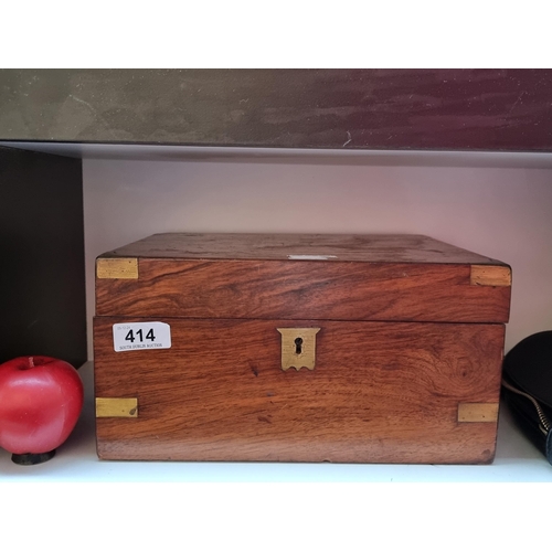 An exquisite Edwardian walnut writing slope featuring brass hardware ...
